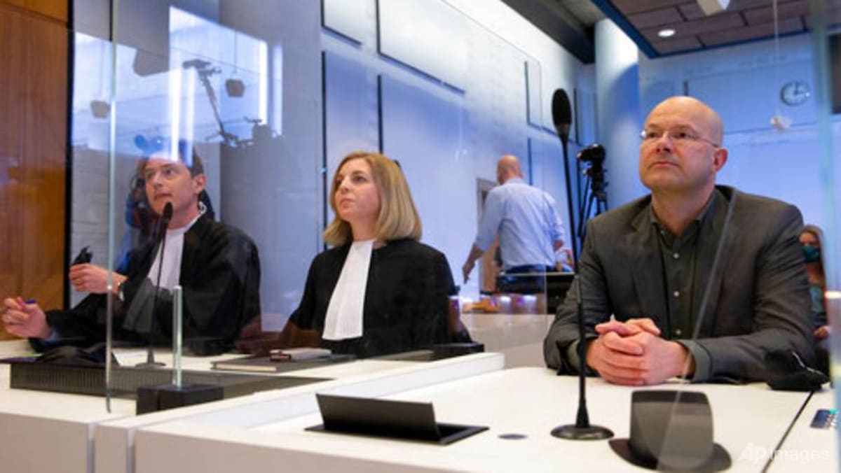 Court orders Royal Dutch Shell to cut carbon emissions - CNA