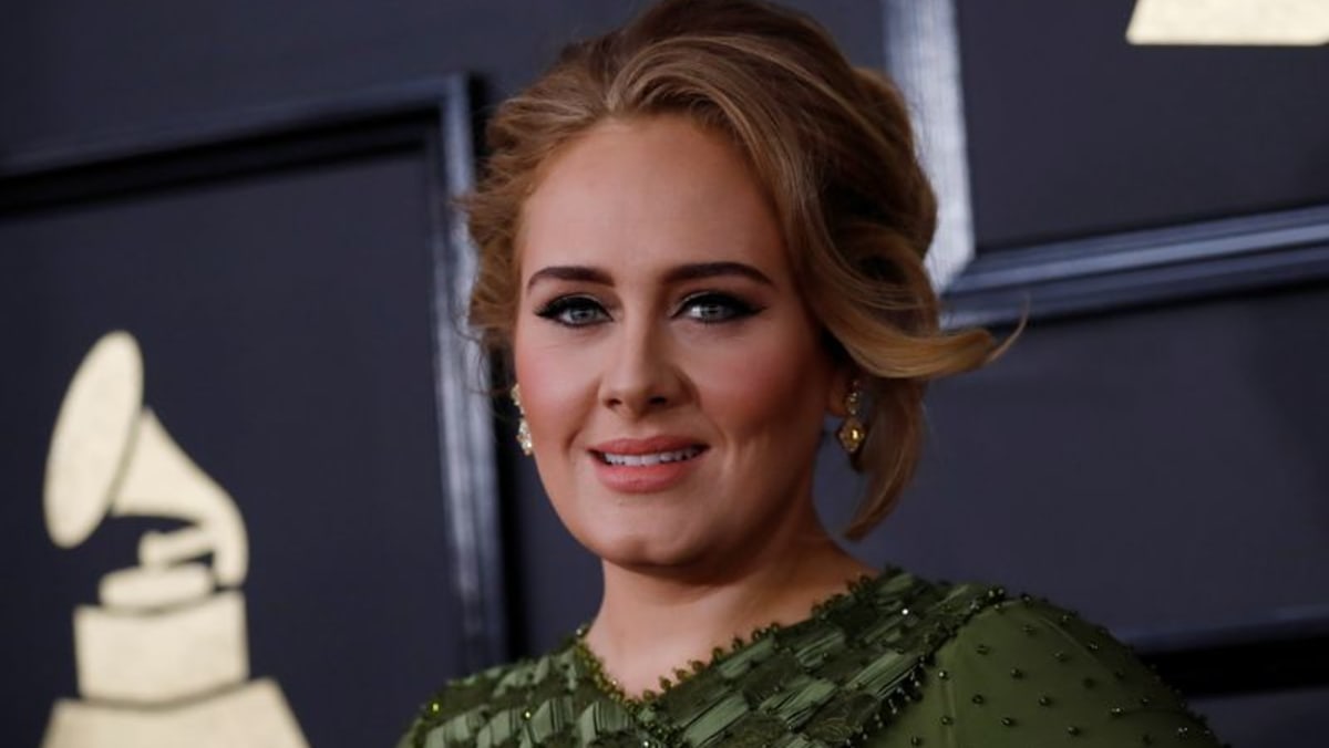 Adele tops UK music charts record-breaking comeback album "30" - CNA