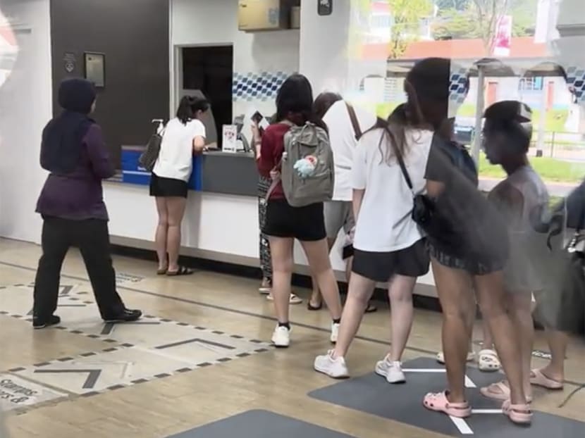 Sleeping overnight with other Swifties outside SingPost office for ...