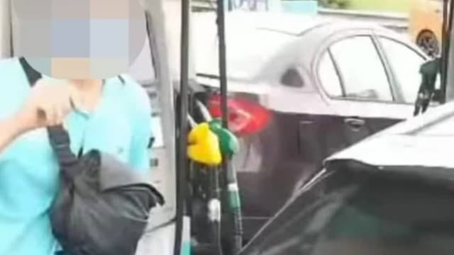 狮城车在马国打RON95汽油 司机当场被骂爆 - 8world