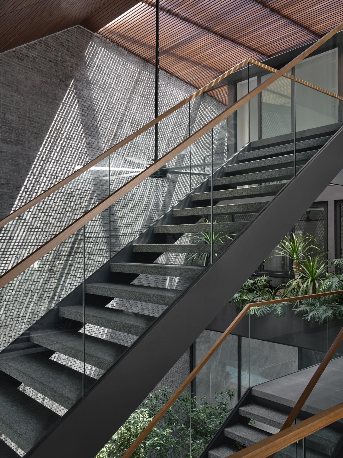 This house in Singapore is a tropical oasis filled with plenty of light ...