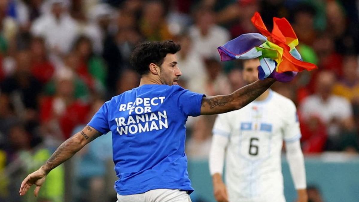 FIFA boss Infantino helped set me free, says World Cup pitch invader - CNA