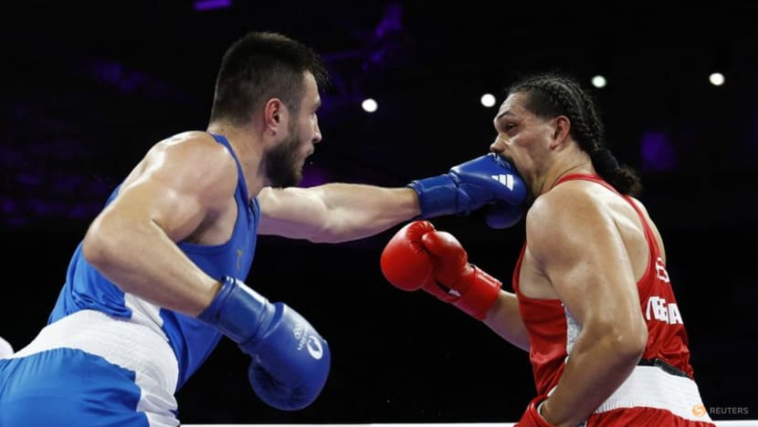 Jalolov beats Australia's Teremoana as gender row rolls on - CNA