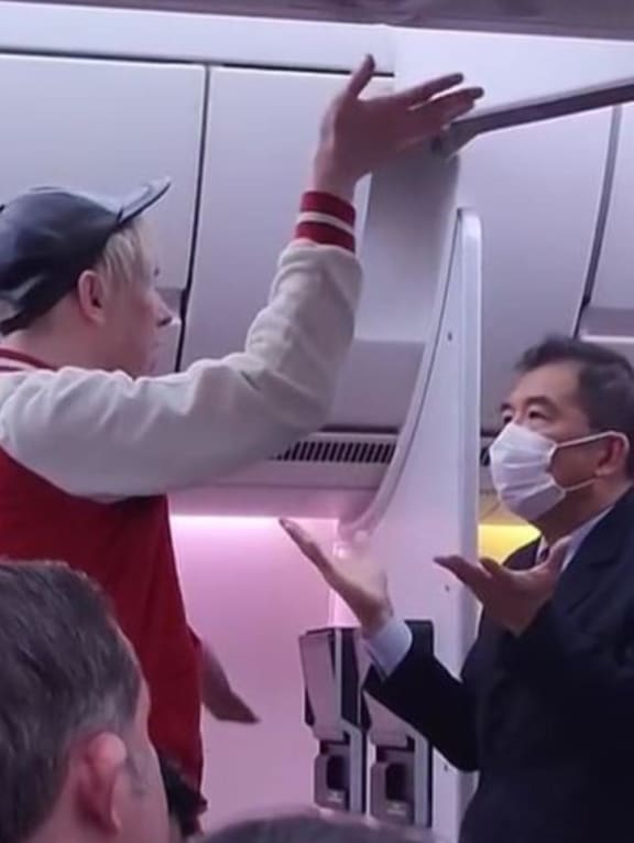 ‘Unruly’ passenger seen in viral clip hurling vulgarities at SIA cabin crew handed over to ...