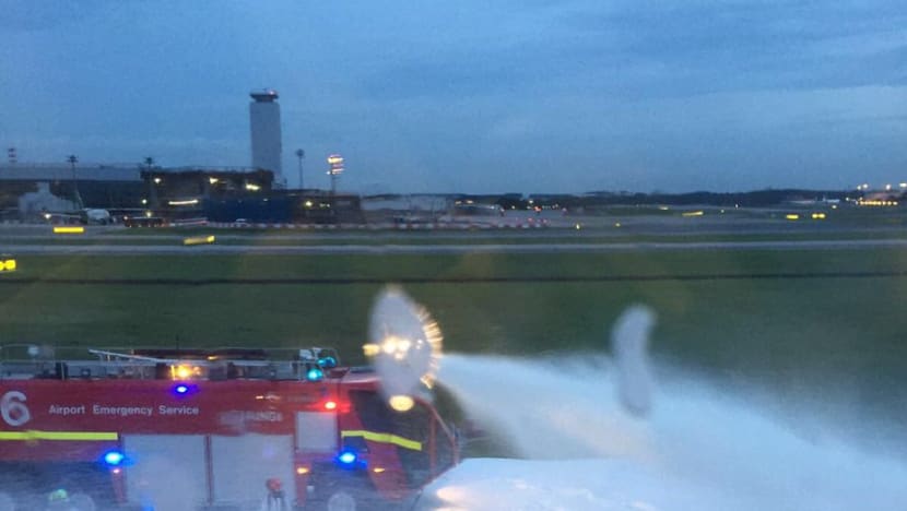 SIA flight catches fire while making emergency landing in Singapore - CNA