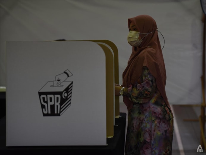 Johor state election: Voters cast their ballots on polling day amid ...