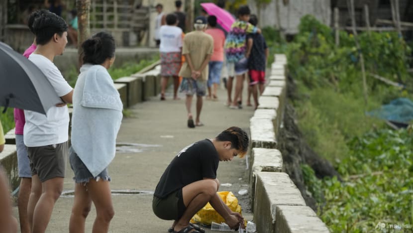 Philippine ferry was overloaded when it flipped over, leaving 26 dead ...