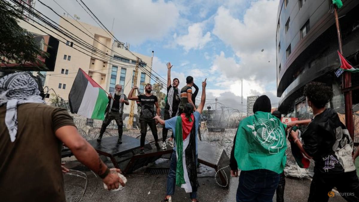 Protesters near US embassy in Beirut sprayed with water cannon, teargas ...