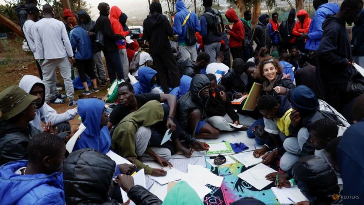 Migrant children treated like adults as record influx overwhelms Canary ...