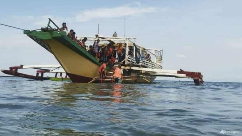 Philippine coast guard rescues 67 people from damaged boat in the ...