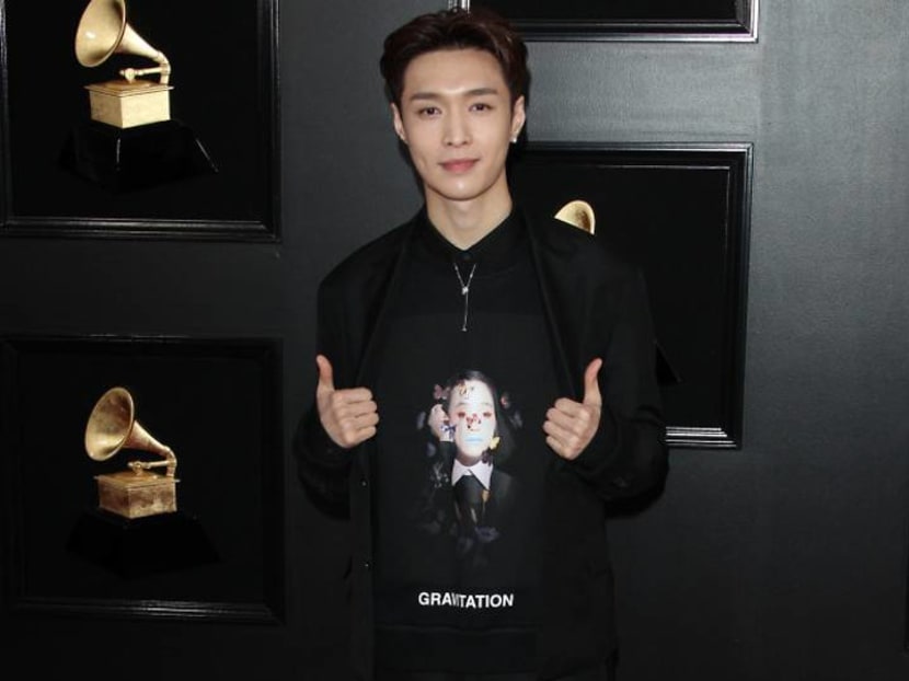 Lay Zhang Walking And Using His Laptop At The Same Time Has Become A ...