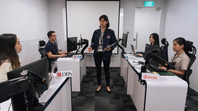 警方与四银行展开联合行动 避免1万5000人受骗 - 8world