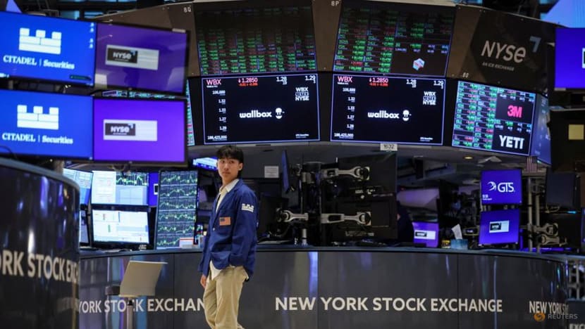 Wall Street sends stocks up, dollar down ahead of Fed news - CNA