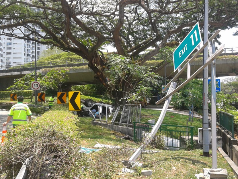 Car crashes into road sign, overturns - TODAY