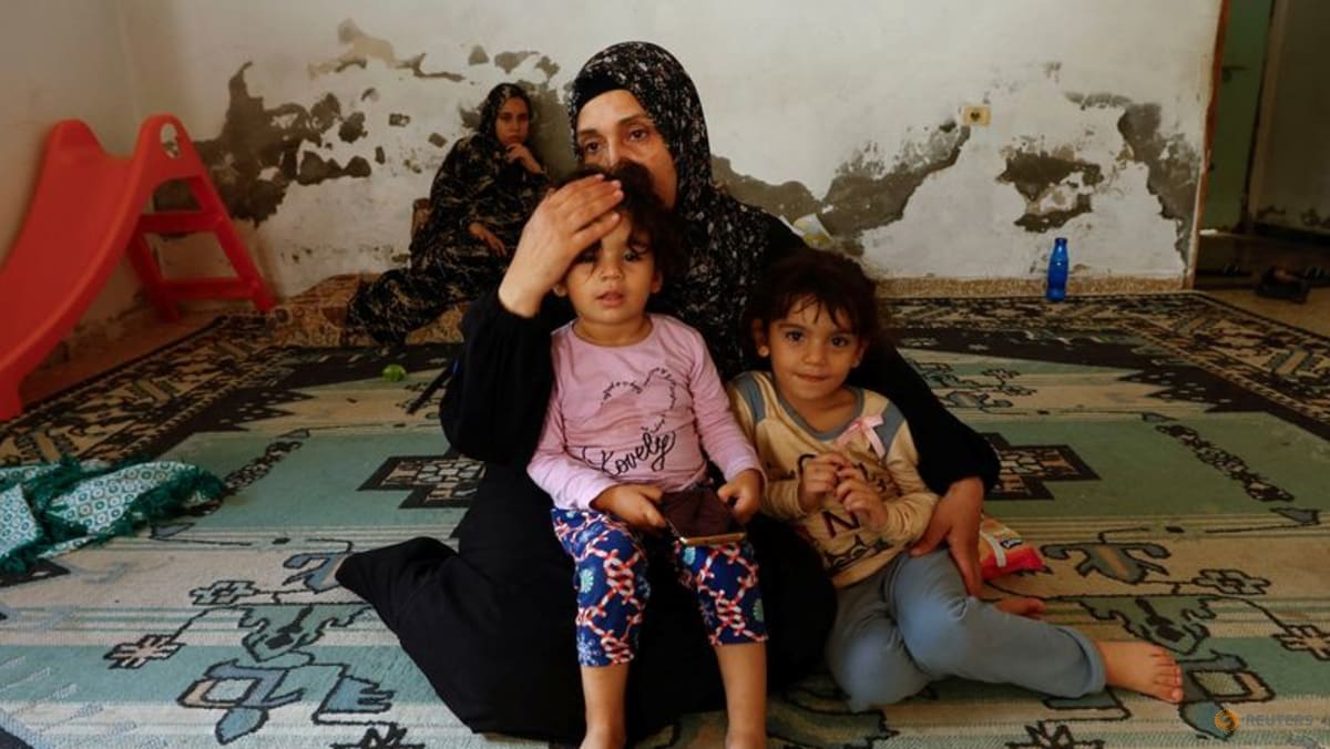 Fleeing Gaza mother cries: 'What did my children do to deserve this ...