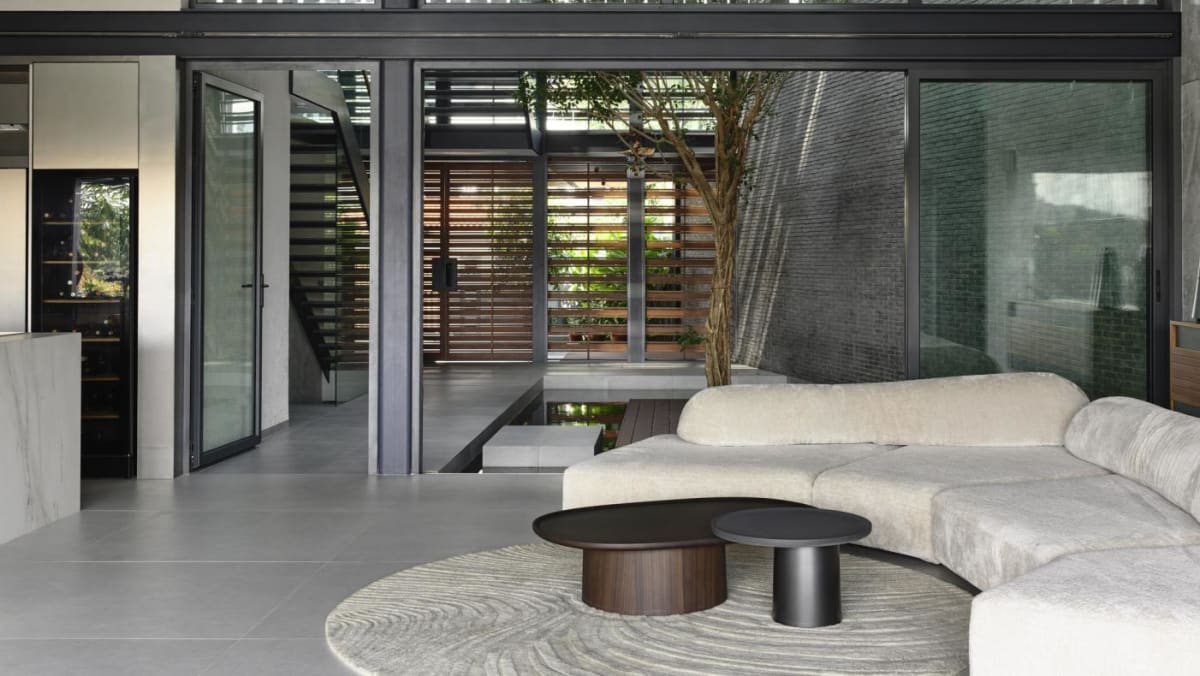 This house in Singapore is a tropical oasis filled with plenty of light ...