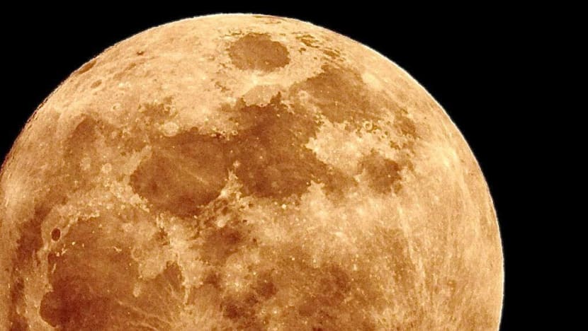 In pictures: First of two supermoons in August over Singapore - CNA