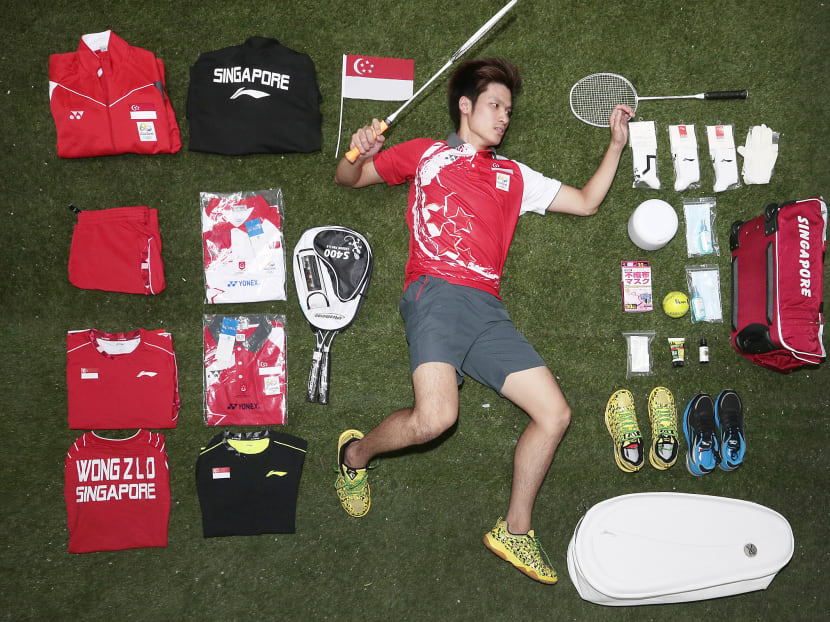Team Singapore’s flagbearer Derek Wong aims for one final smash at ...