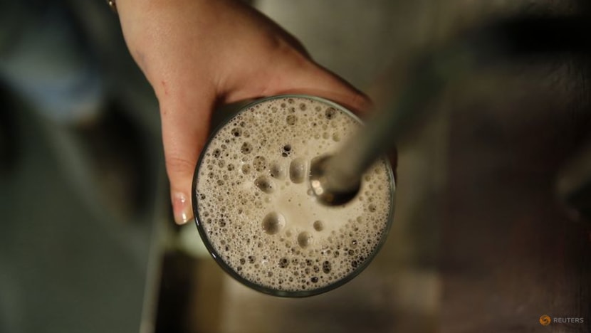 UK backs pubs to open earlier for England's World Cup final - CNA