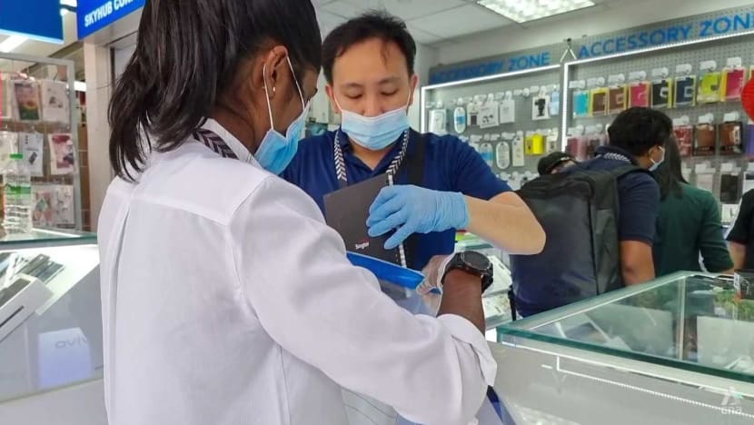 Police raid 17 handphone shops in crackdown on SIM cards registered to ...