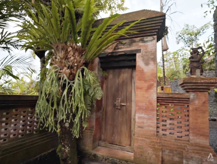 A modern Balinese longhouse built with lava stones from the volcano ...