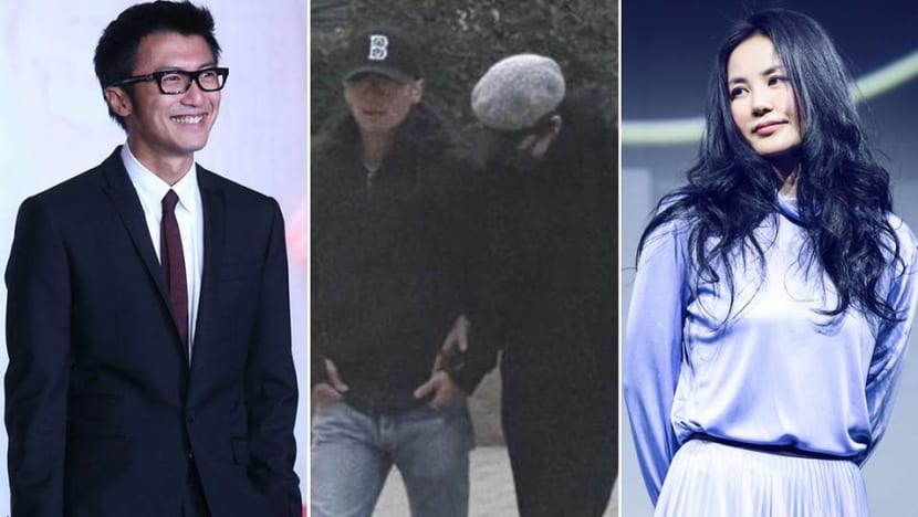 Faye Wong keeps warm while strolling with Nicholas Tse - 8days