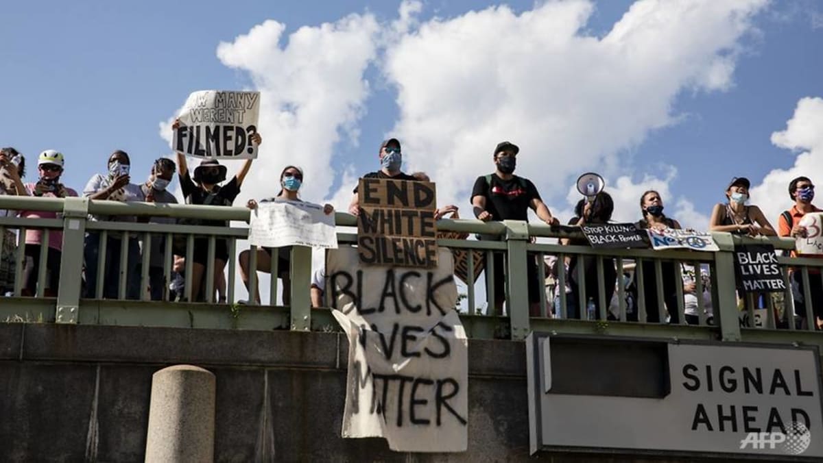 'Time for a change': Anti-racism protesters march across US - CNA