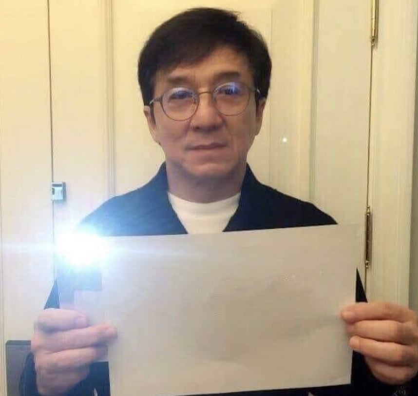 Photo Of Jackie Chan Holding An Empty Sheet Of Paper Goes Viral Amidst ...