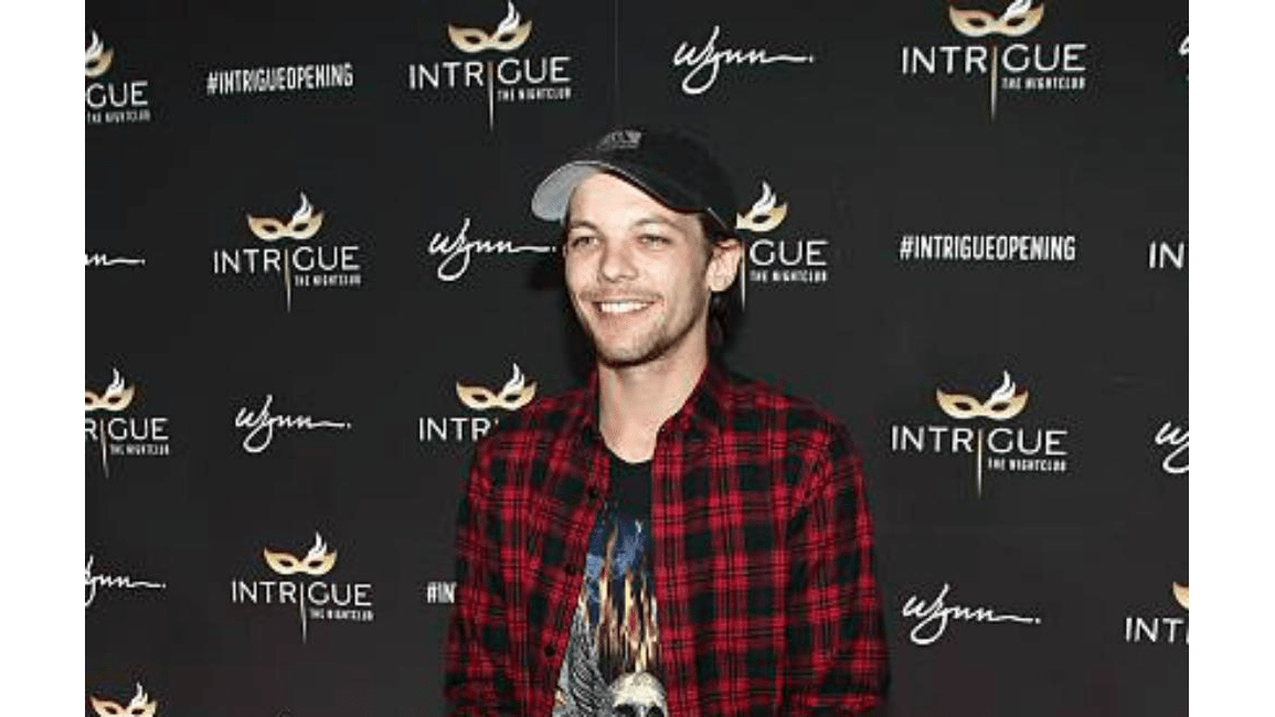 Louis Tomlinson signs with Syco - 8days