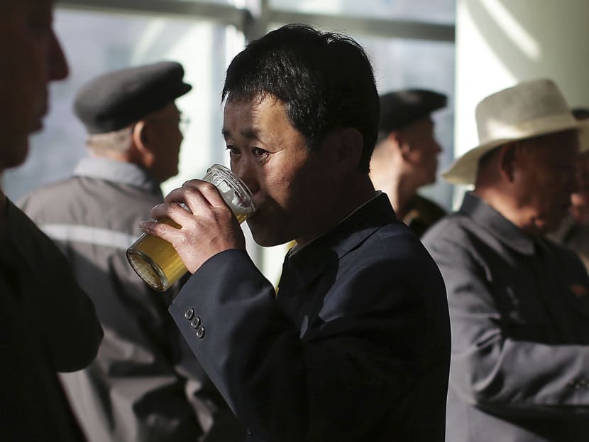Gallery: For tired Pyongyang workers, beer’s on tap at stand-up bars ...