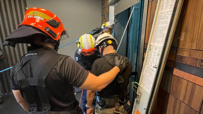 Three people rescued after getting trapped in lift - CNA