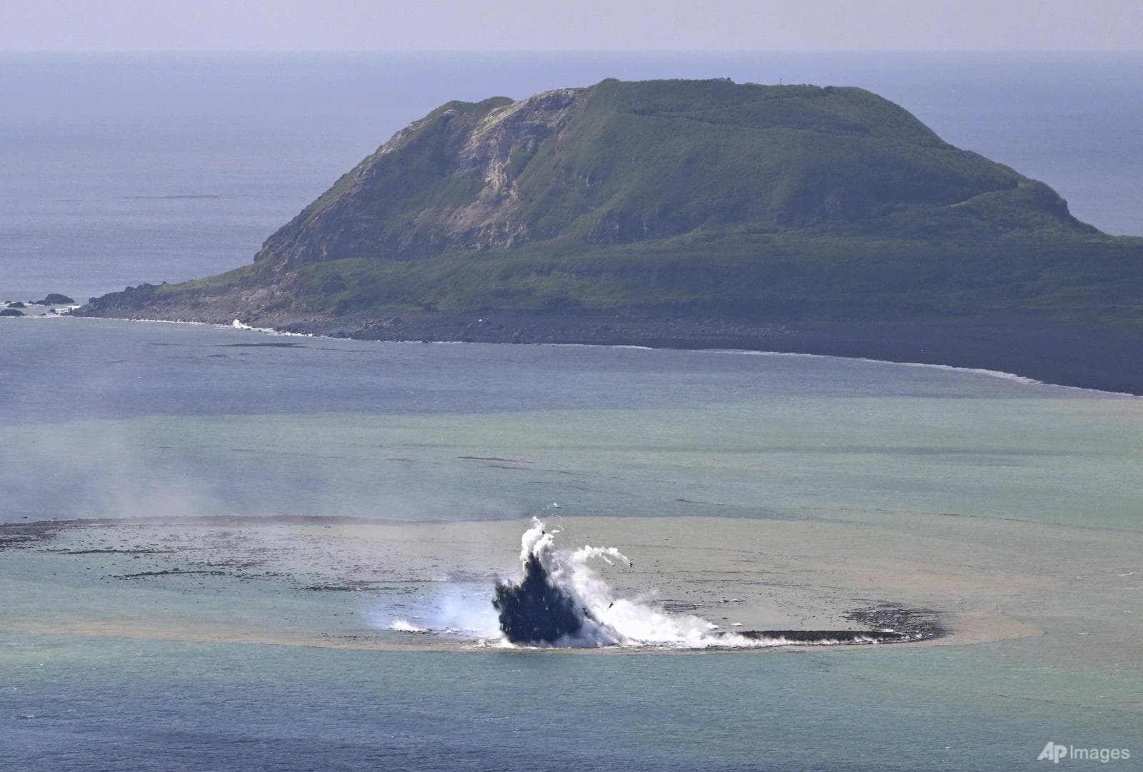 New island emerges after undersea volcano erupts off Japan, but experts ...
