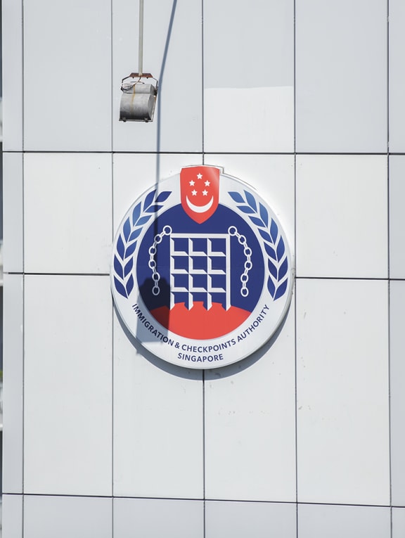 Processes reviewed at ICA Building after surge in passport demand; walk ...