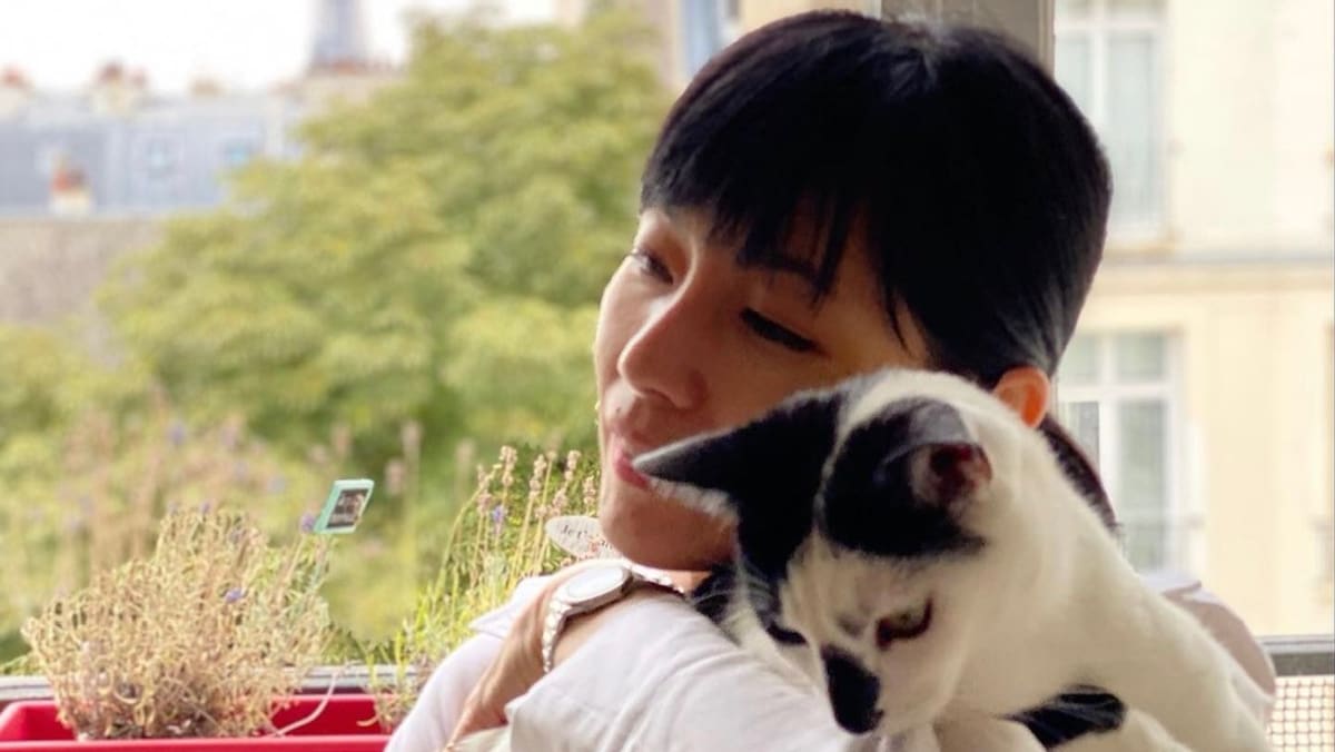 Sharon Au returns to Paris and reunites with her cat after 12 weeks in ...