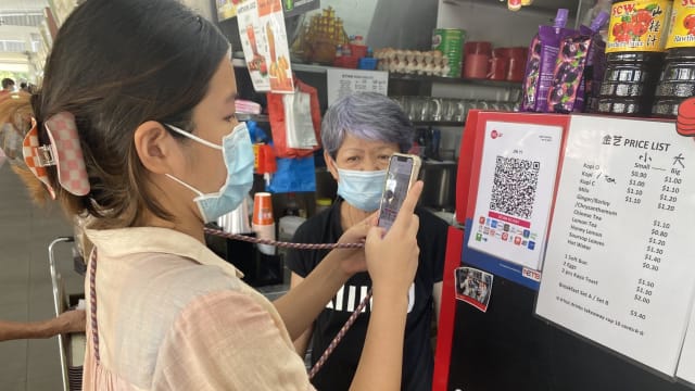 摊主乐学数码计划政府津贴延长到明年底 - 8world