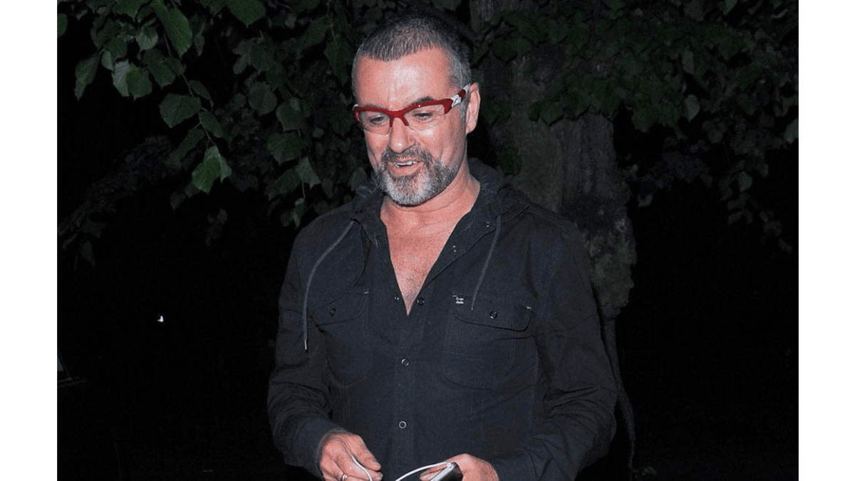 George Michael's family to remove home tributes - 8days