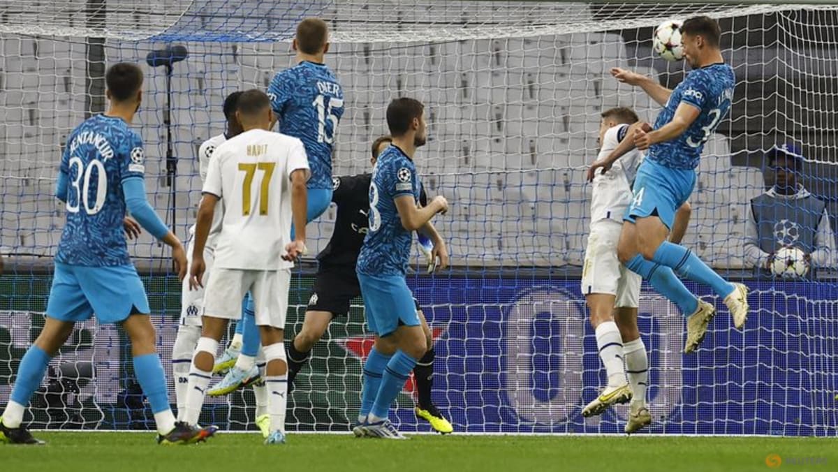Spurs snatch 2-1 win at Marseille to qualify as Champions League group ...