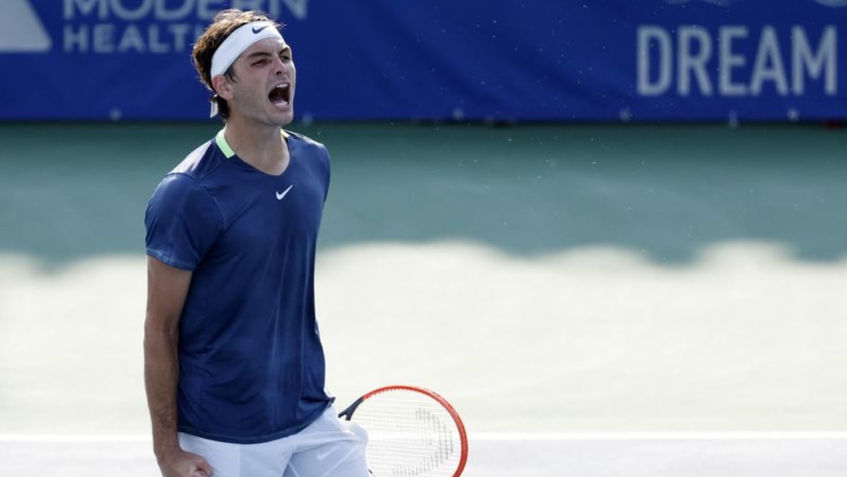 Fritz wins twice in one day to reach semis in Washington - CNA