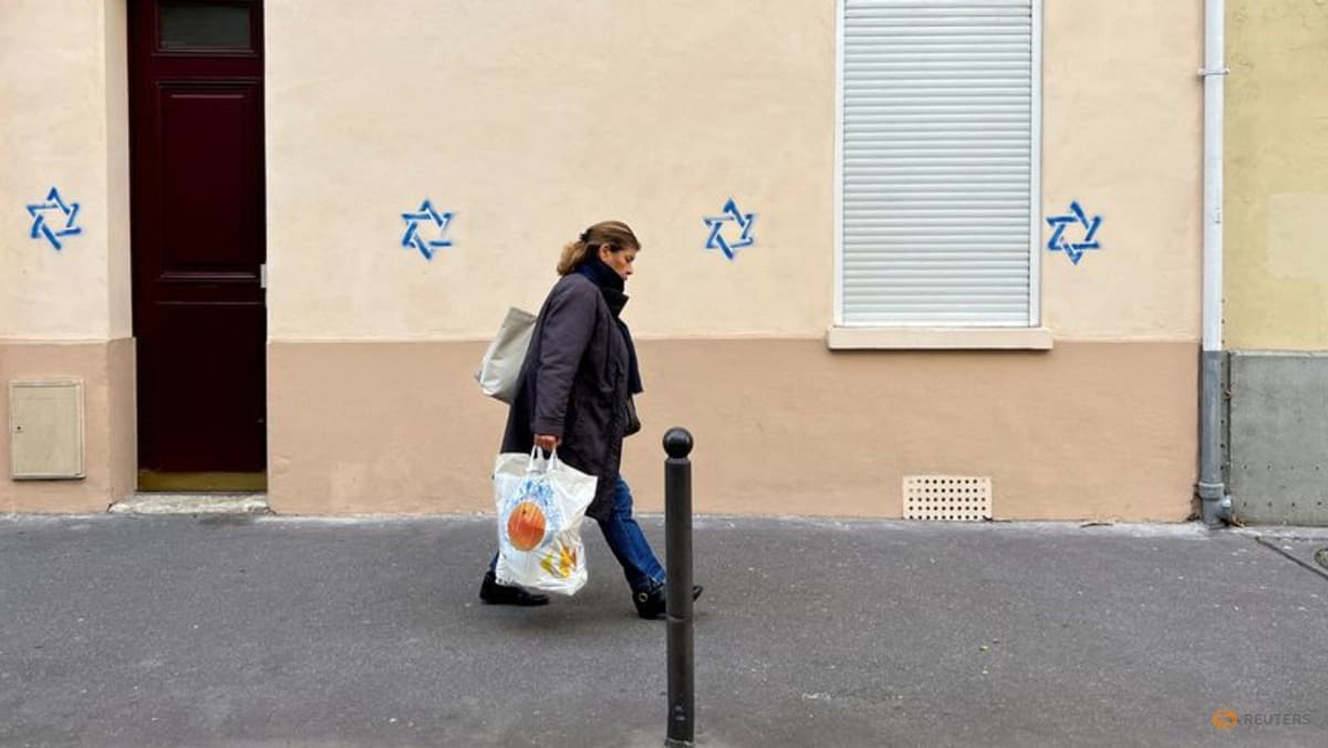 France accuses Russia of 'online meddling' over Stars of David graffiti ...