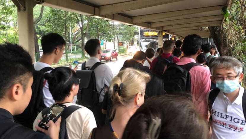 Commuters cope with rain, longer journeys on day 2 of East-West Line ...
