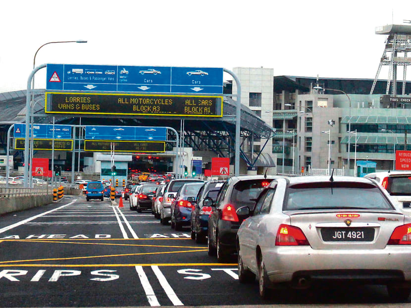 Off-peak toll charges implemented by S'pore at Second Link on April 1 ...