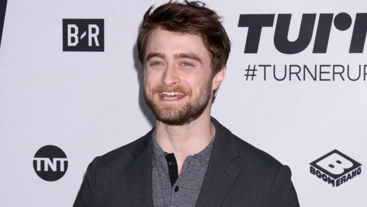 Daniel Radcliffe On Trading His Wand For Angel Wings, Flexing His ...