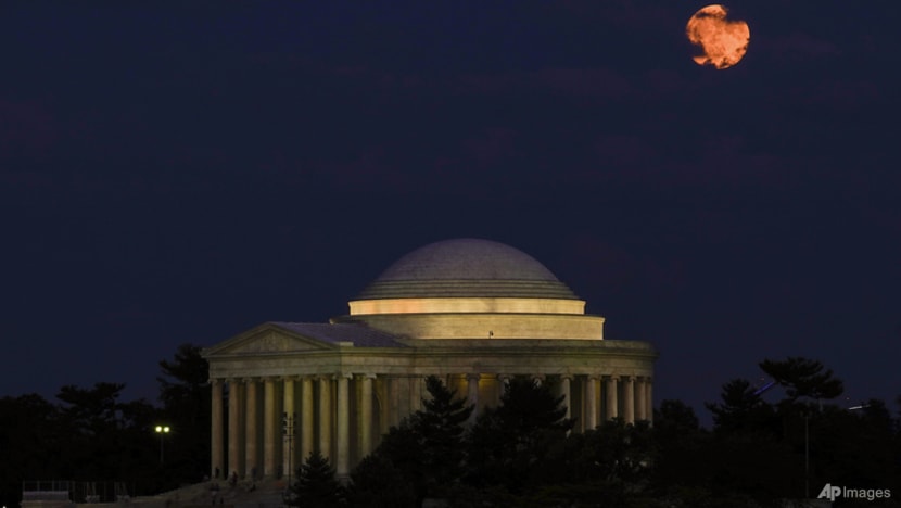 In pictures: First of two supermoons in August over Singapore - CNA