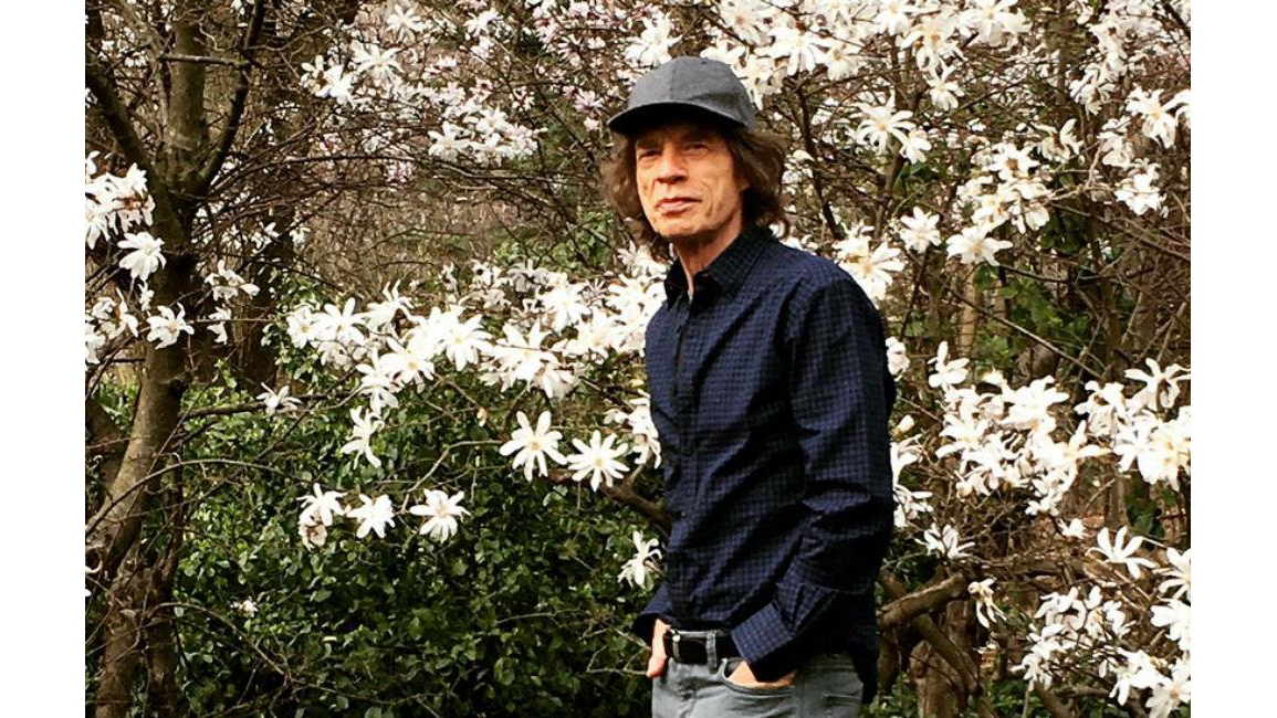Sir Mick Jagger gets outside after surgery - 8days