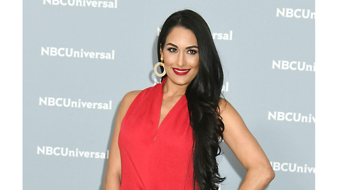 Nikki Bella and Artem Chigvintsev are 'having fun' - 8days