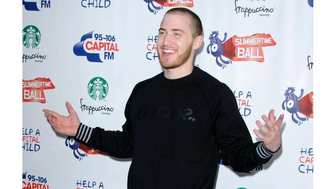 Mike Posner stays silent to preserve voice - 8days