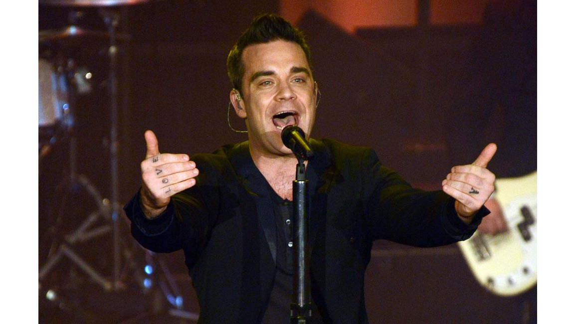 Robbie Williams unveiling more rare songs - 8days