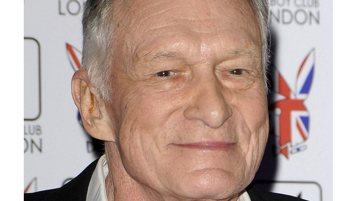 Hugh Hefner enjoying life - 8 Days