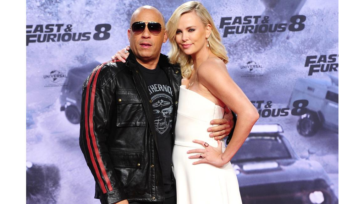 Vin Diesel was 'not complaining' when he kissed Charlize Theron - 8days