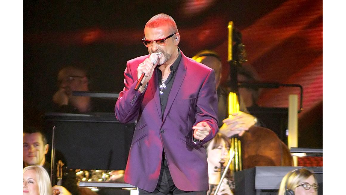 George Michael resurrected at BRITs for duet with Chris Martin - 8days